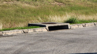 What Were They Thinking? - Sheet Drain to Detention Pond